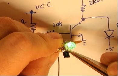 Design, Build and Test Red/Green LED with Single press change ...
